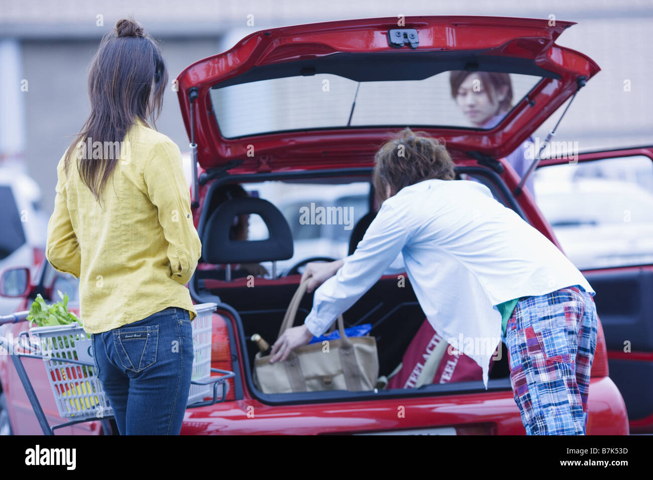 Woman loading shopping groceries hi-res stock photography and images ...