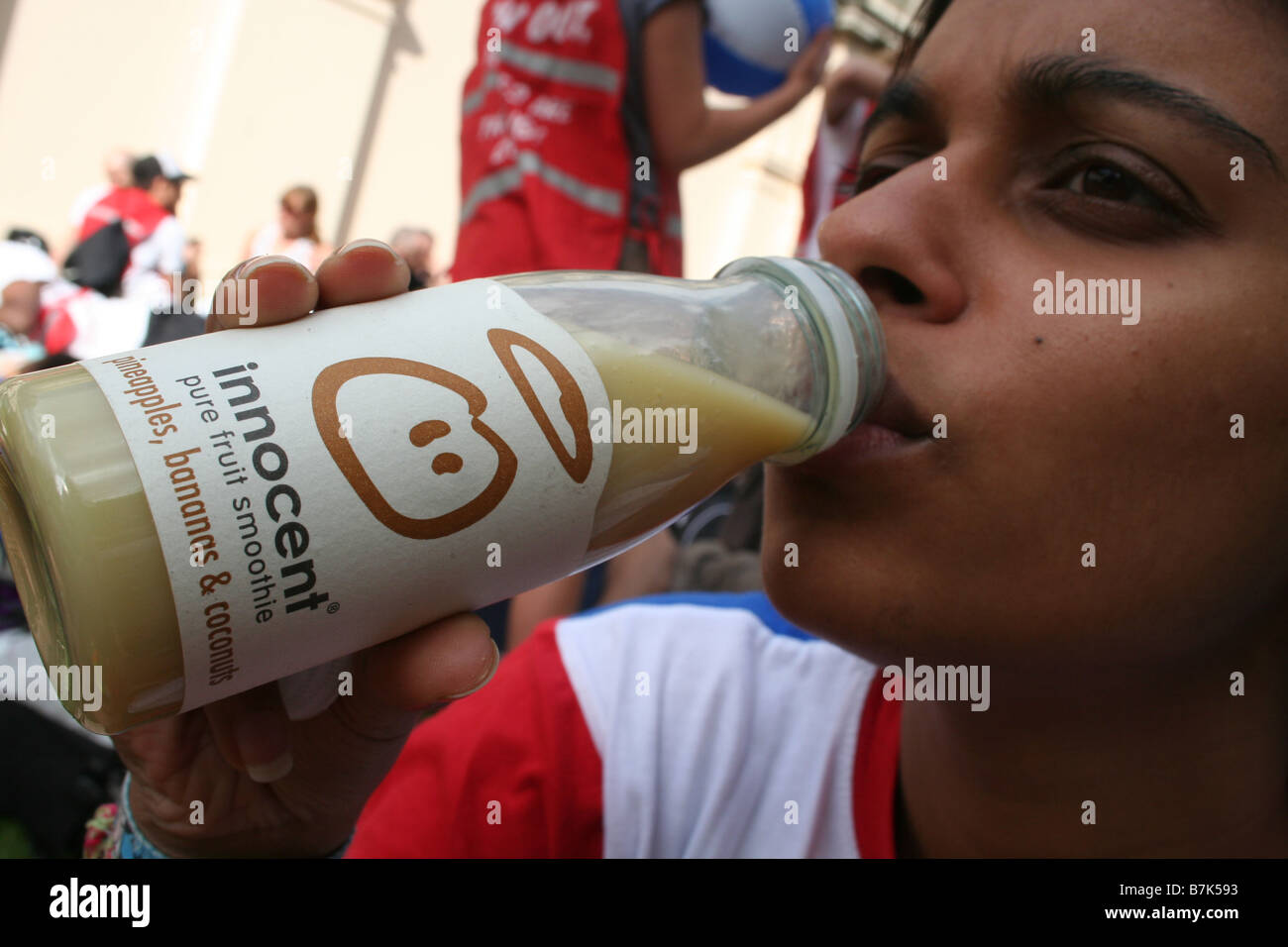 Women Drinking a Innocent Smoothie Fruit Drink Stock Photo - Alamy
