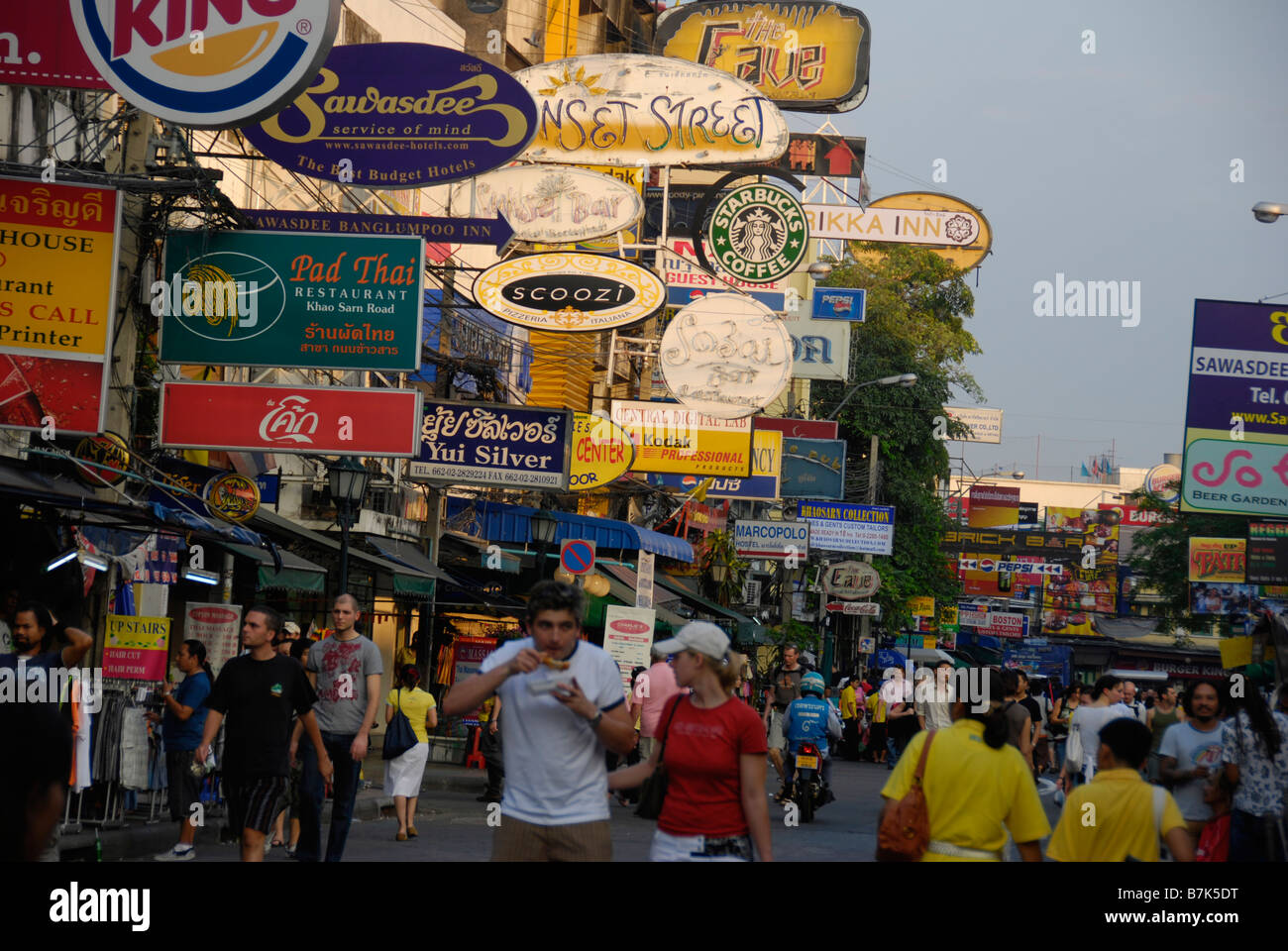 Khao San Road in evening with signs Stock Photo - Alamy