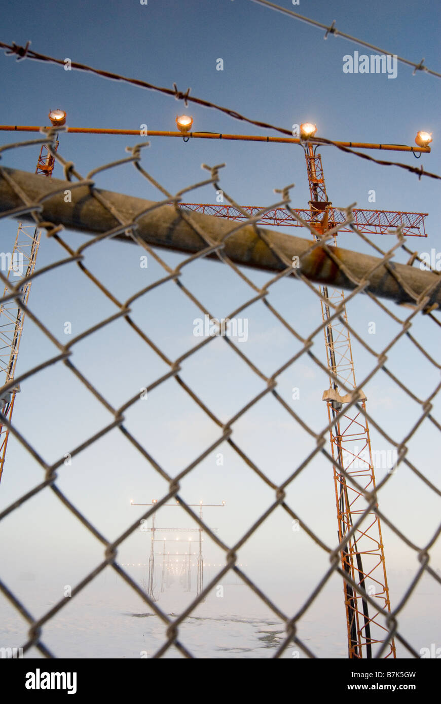Airport approach towers and chain link fence, Victoria International ...