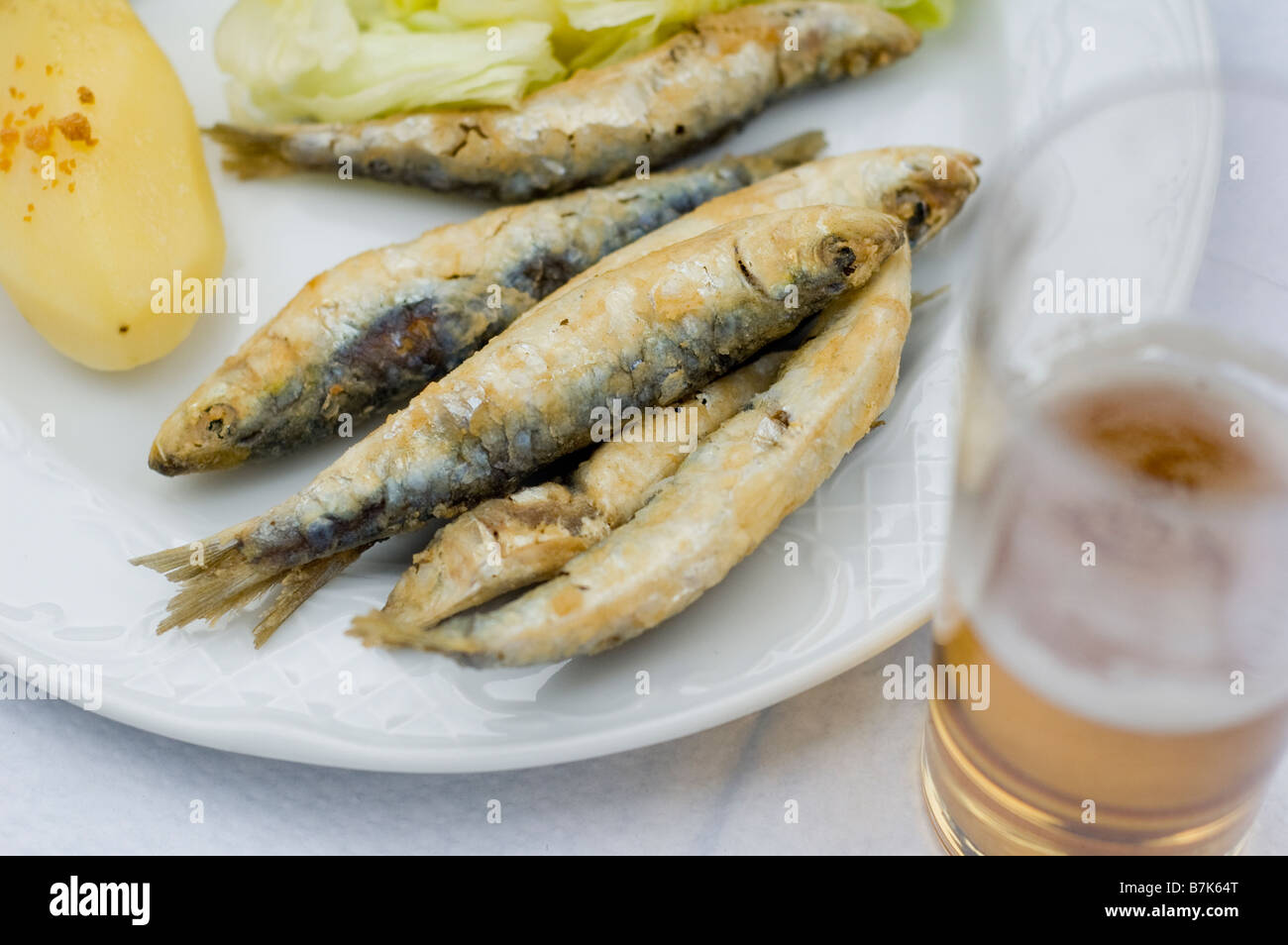 fish on a plate spain Stock Photo - Alamy