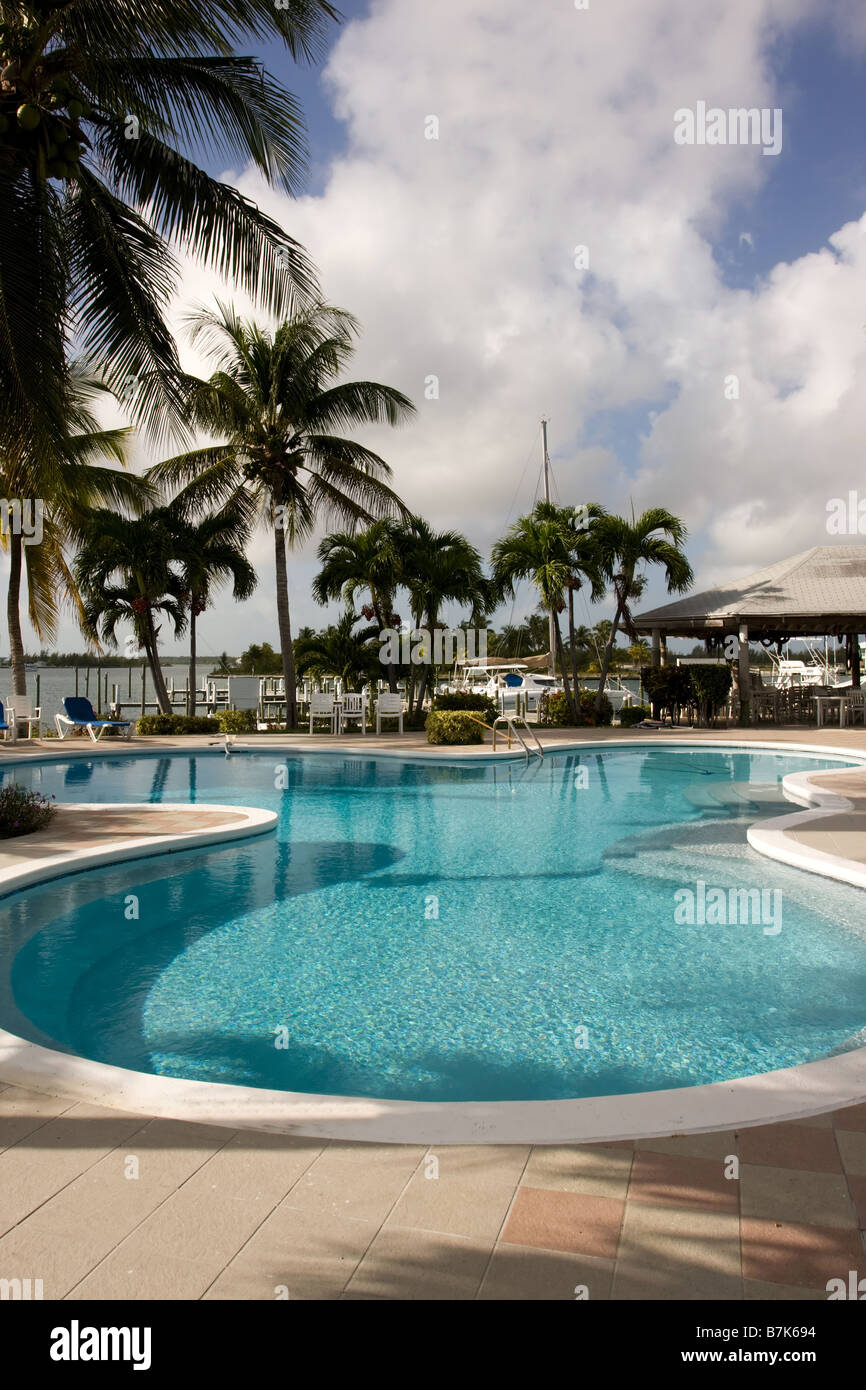 marina swimming pool with blue sun beds and chairs Stock Photo - Alamy