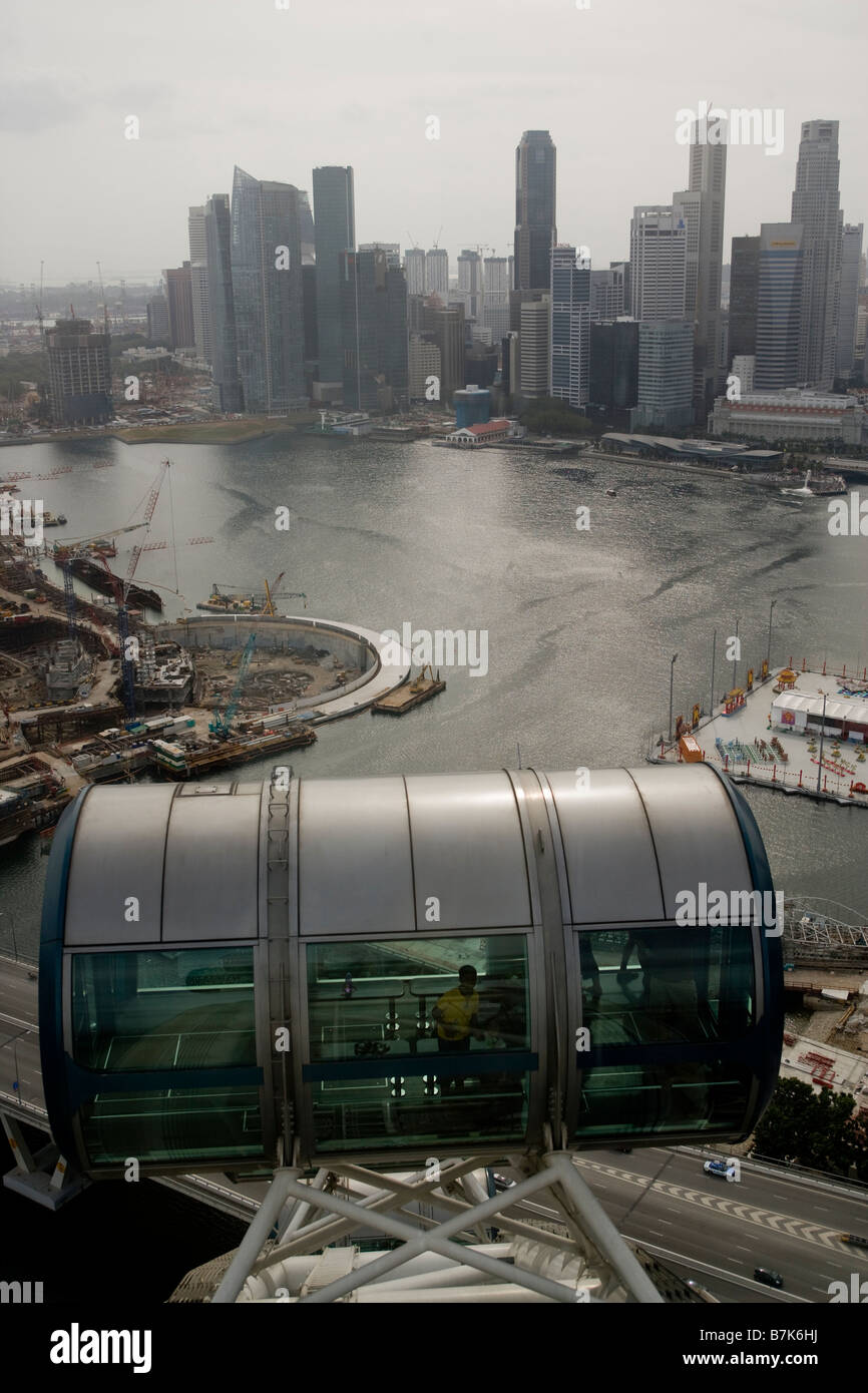 Passengers are seen in a capsule on the Singapore Flyer in Singapore ...