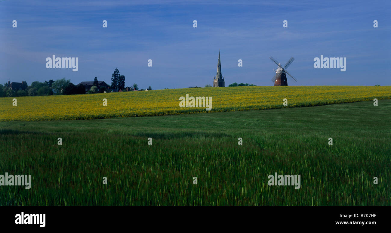 Market town Church spire and windmill on horizon Farmland fields ...
