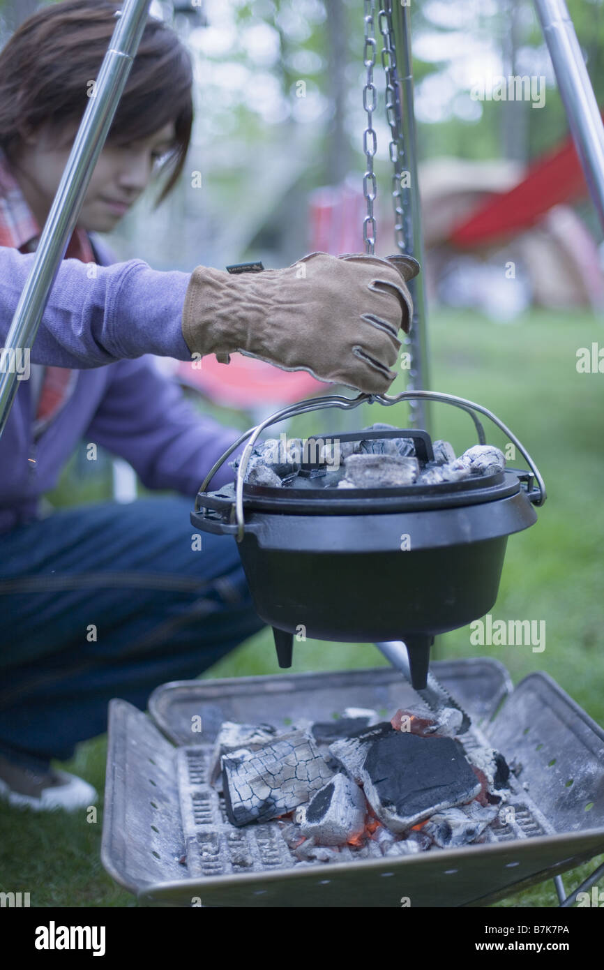 Man holding dutch oven hi-res stock photography and images - Alamy