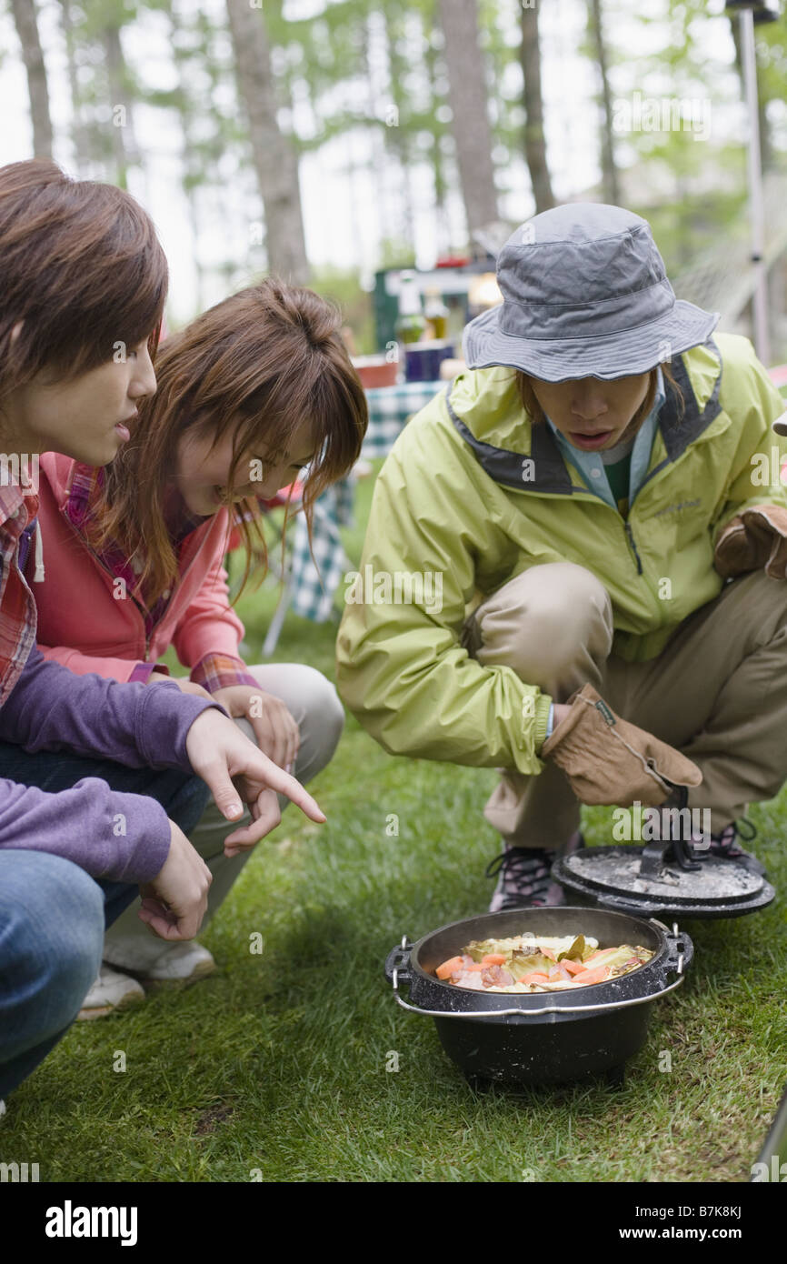Group of Young People on Camping Vacation Stock Photo - Alamy