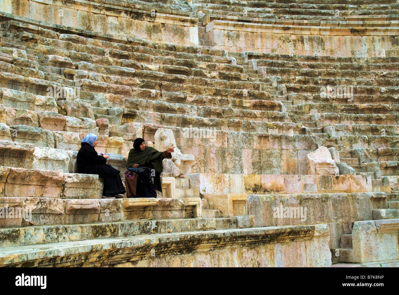 Woman in Roman theatre Amman Jordan Stock Photo - Alamy