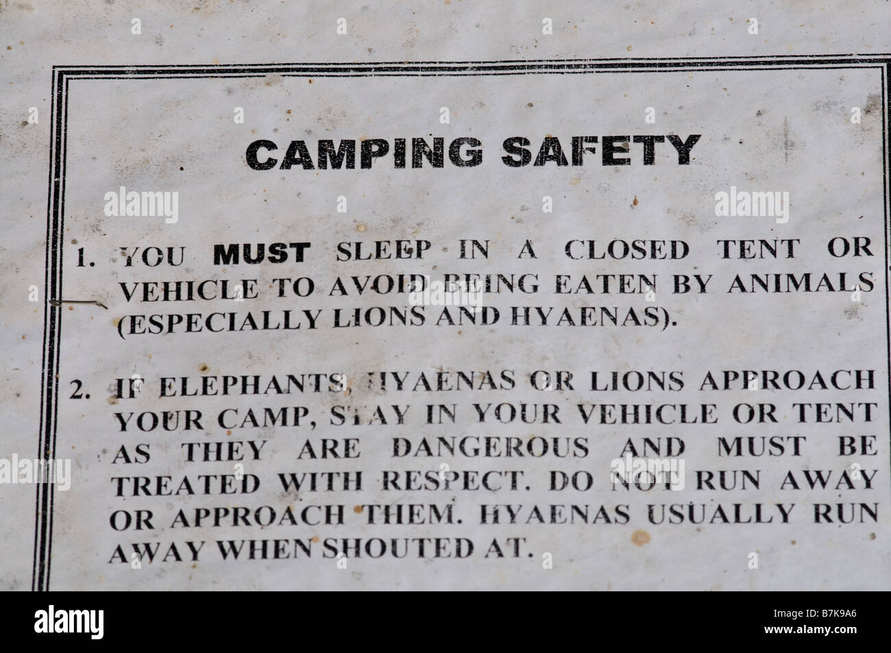 Warning sign Savuti Camp site Stock Photo - Alamy