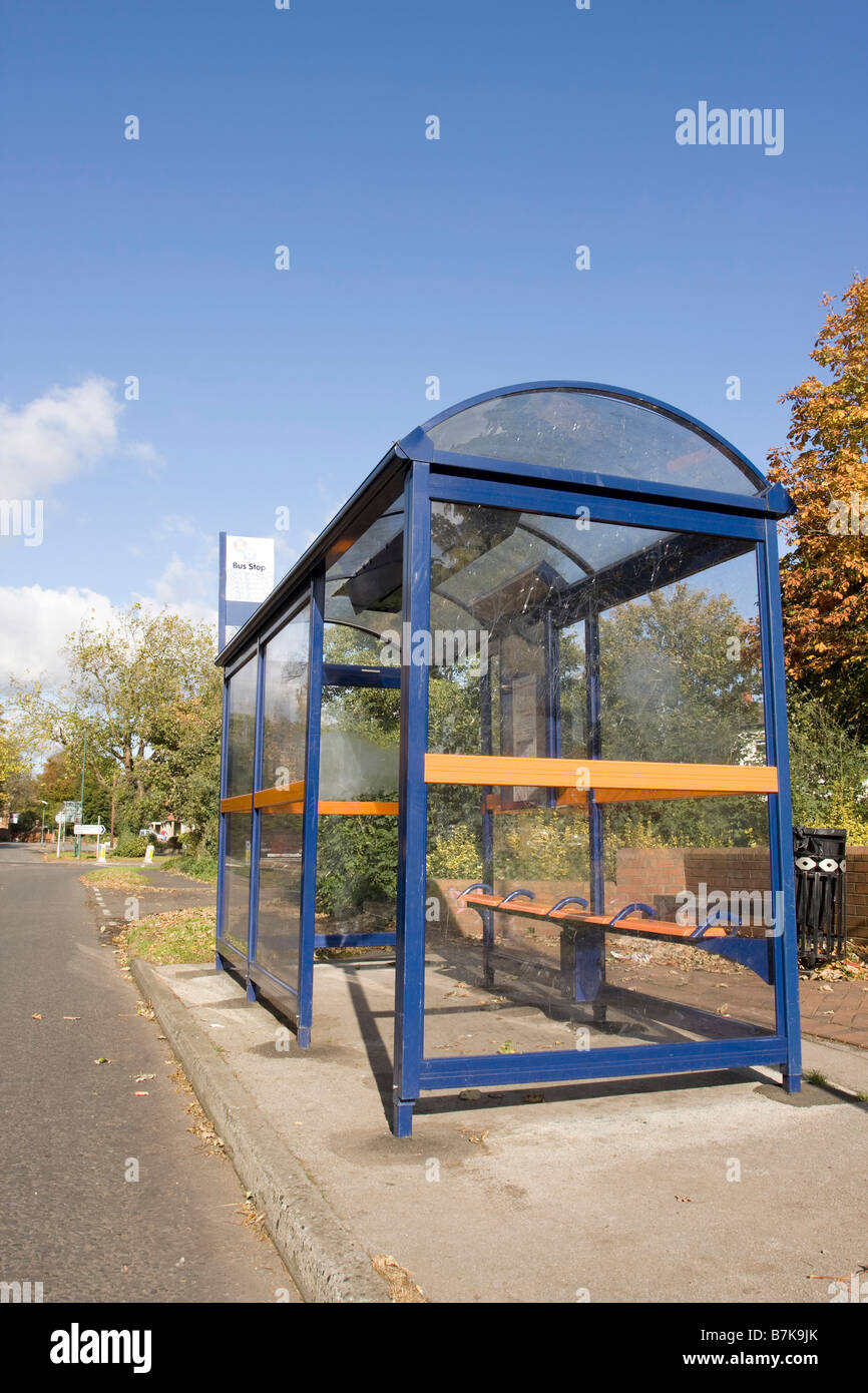 a modern bus stop shelter with seats Stock Photo - Alamy