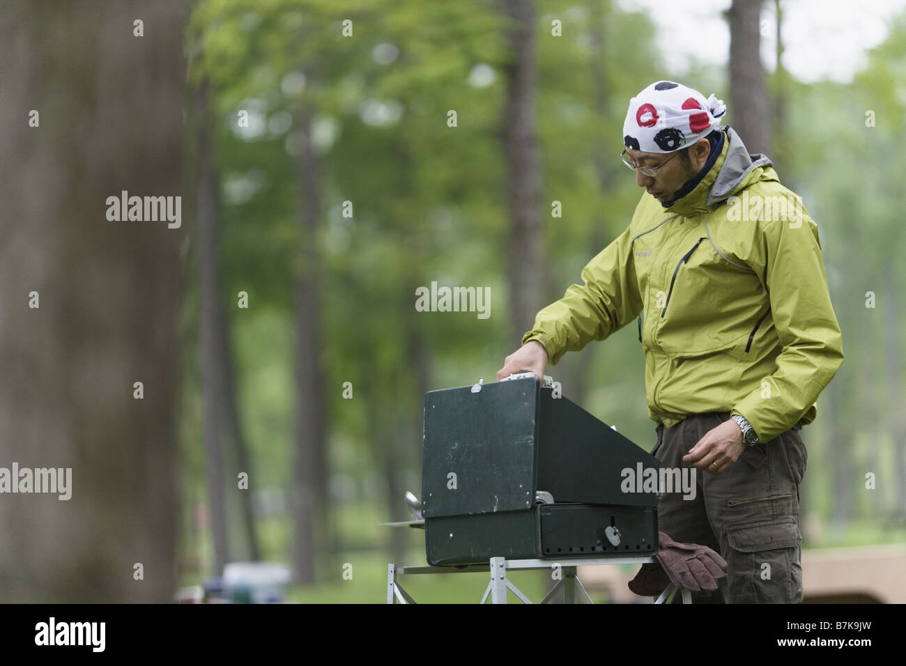 Man Making a Fire with Charcoal Stock Photo - Alamy