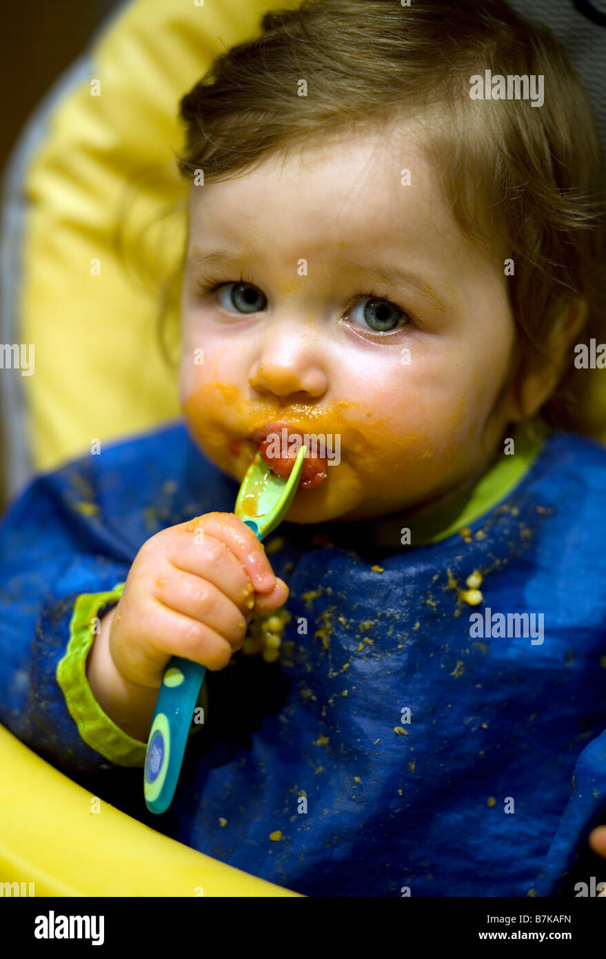 Baby Eating By Herself High Resolution Stock Photography and Images - Alamy