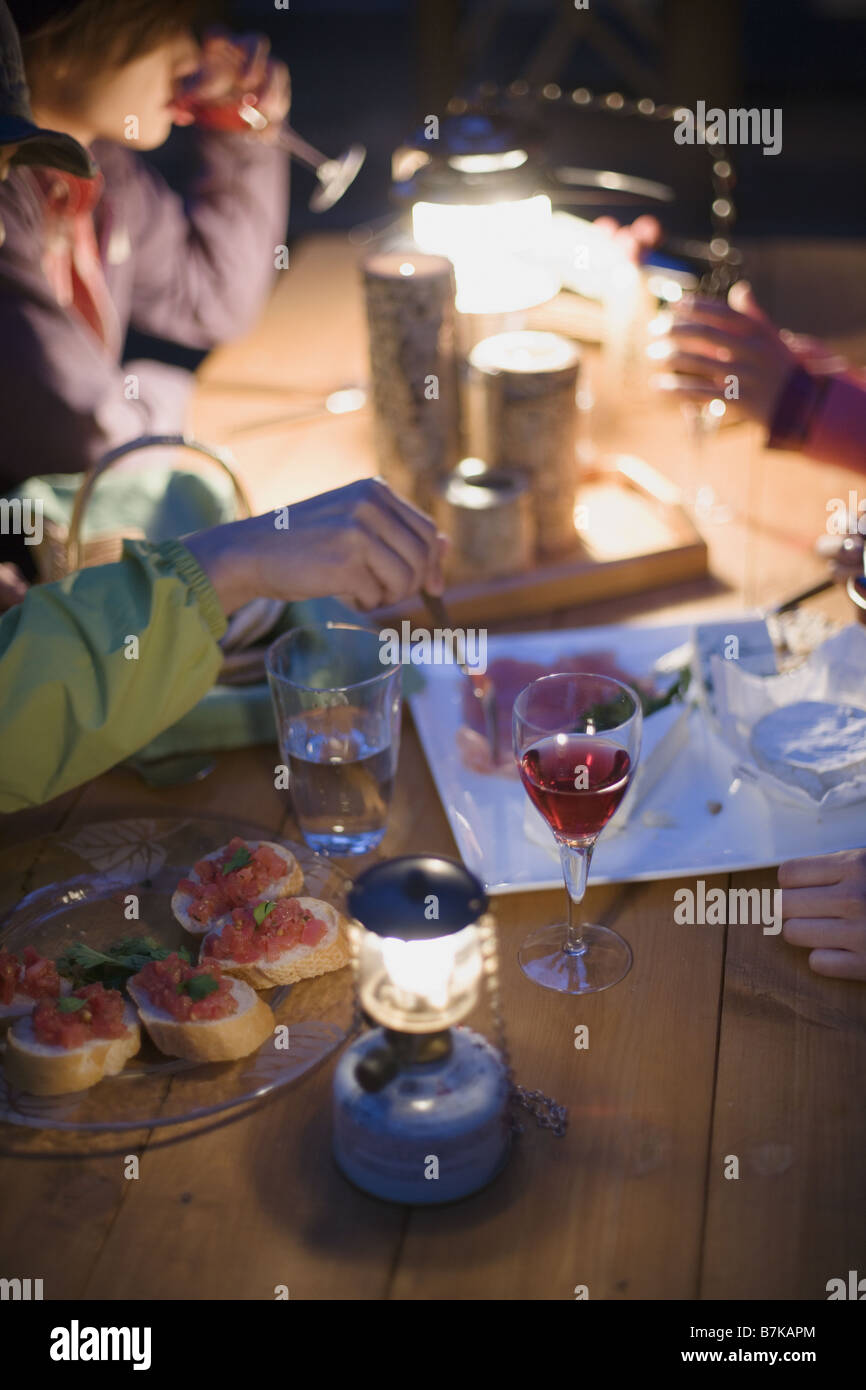 Group of Young People are Chatting on Campsite at Night Stock Photo - Alamy