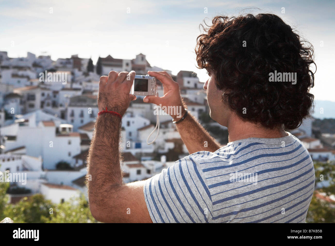 Man taking picture of view Stock Photo - Alamy