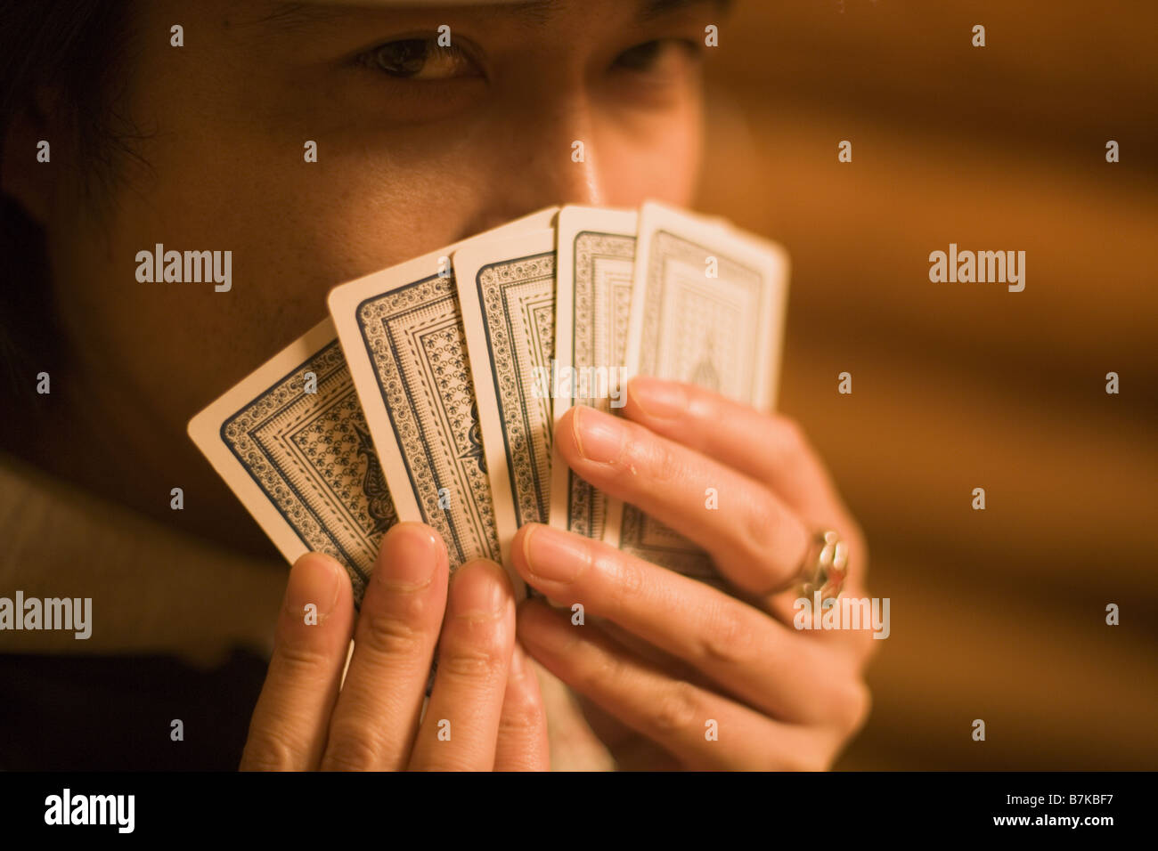 Man Holding Playing Cards Stock Photo - Alamy
