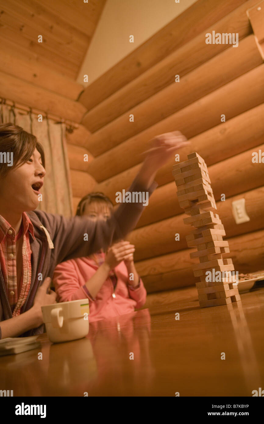 Young Man and Woman Playing Jenga Stock Photo - Alamy