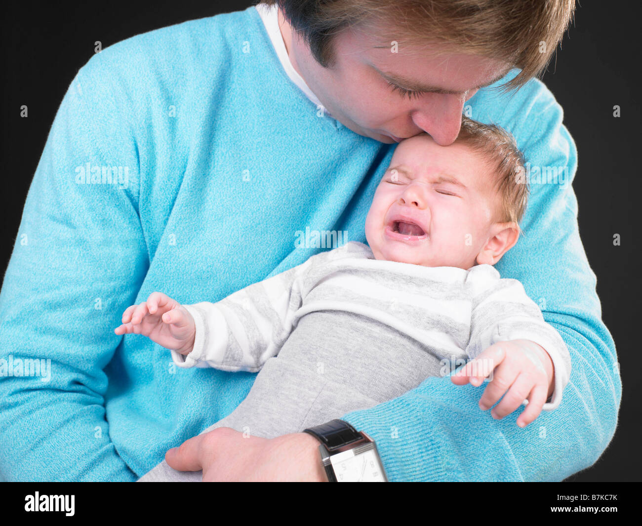 Father comforting crying daughter hi-res stock photography and images ...