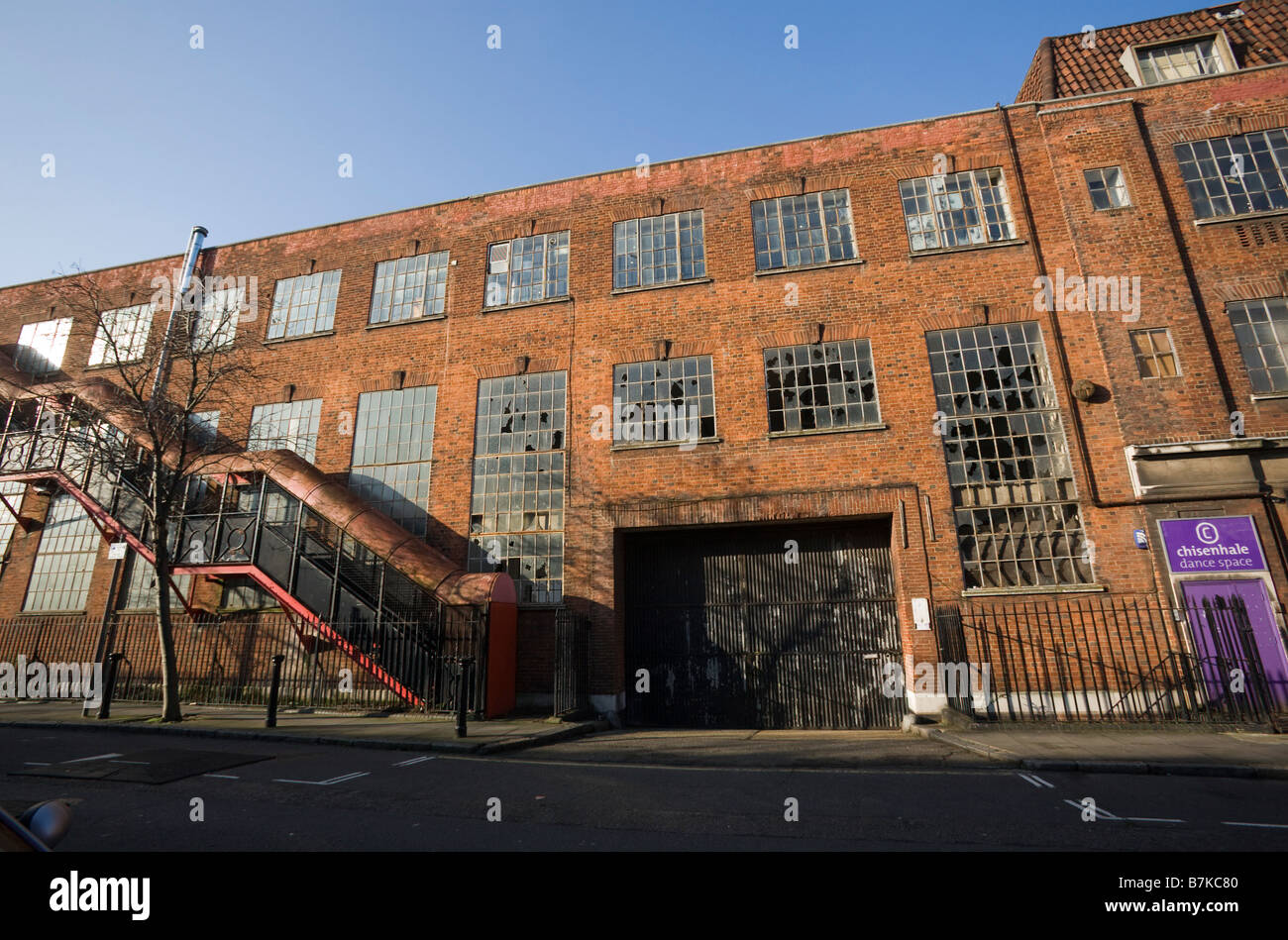 Shattered glass windows in Derelict factory, Tower Hamlets London GB UK ...