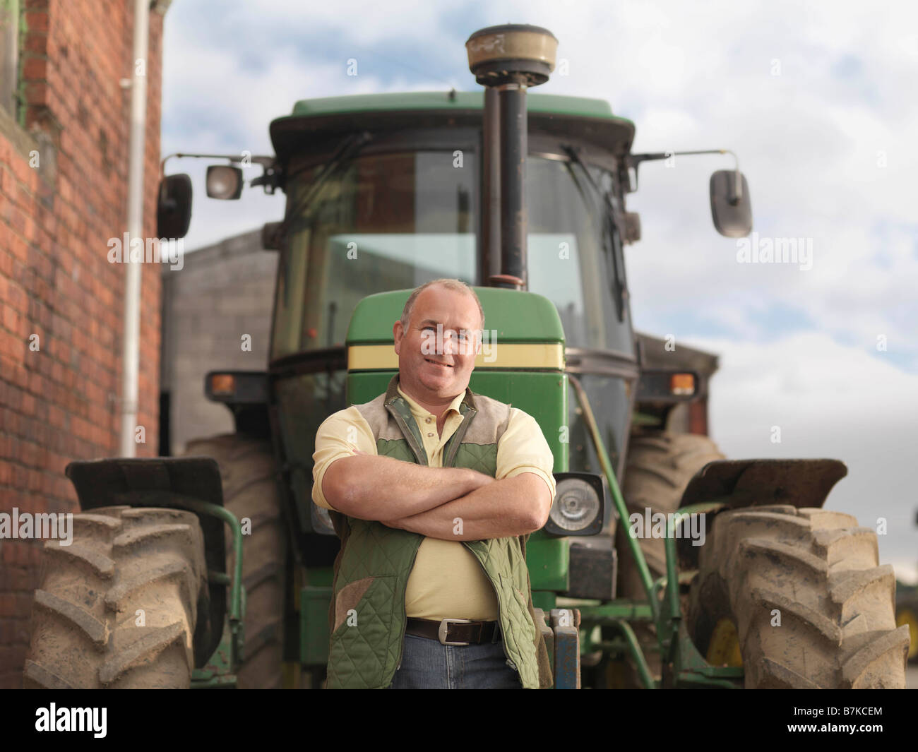 Farmer Posing With Tractor High Resolution Stock Photography and Images ...