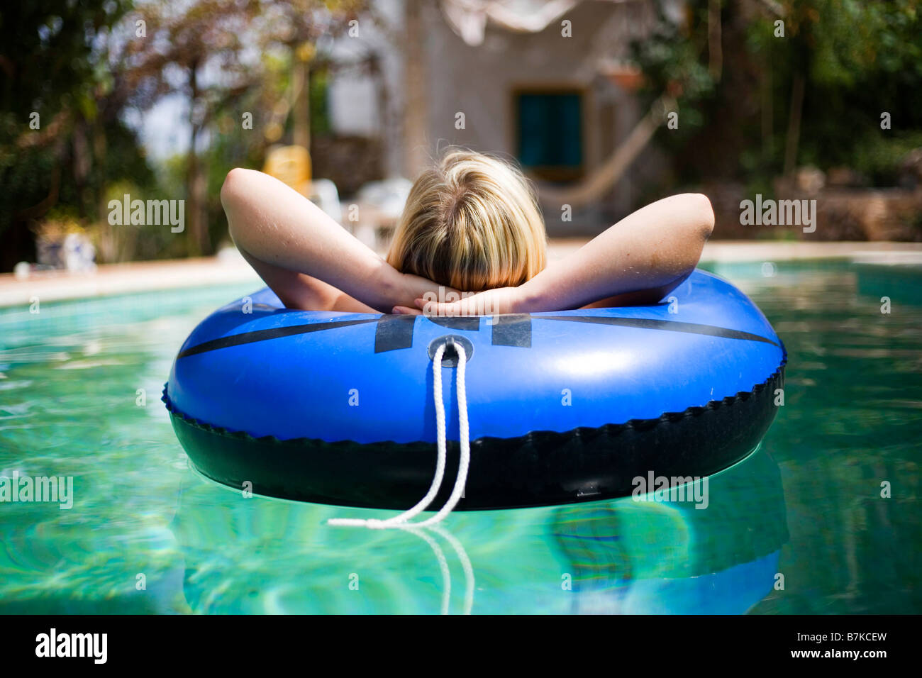 Rear View Of A Woman In A Swimming Pool High Resolution Stock ...