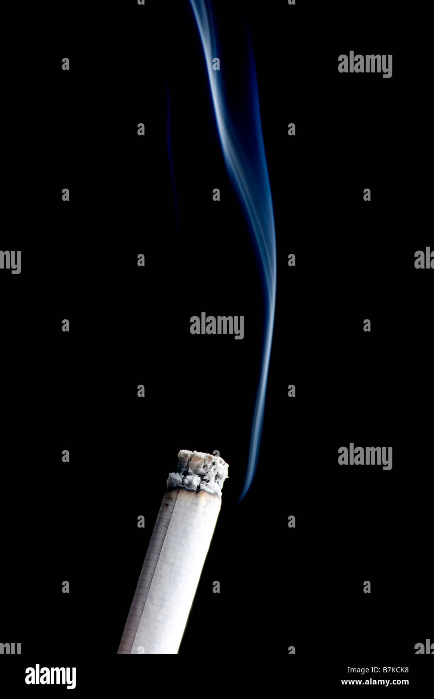 object on black cigarette with smoke Stock Photo - Alamy