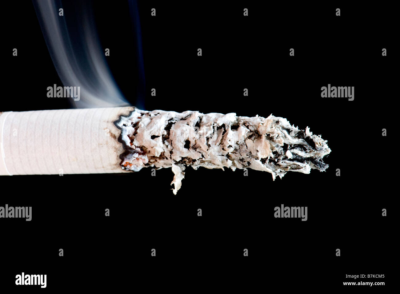 object on black cigarette with smoke Stock Photo - Alamy