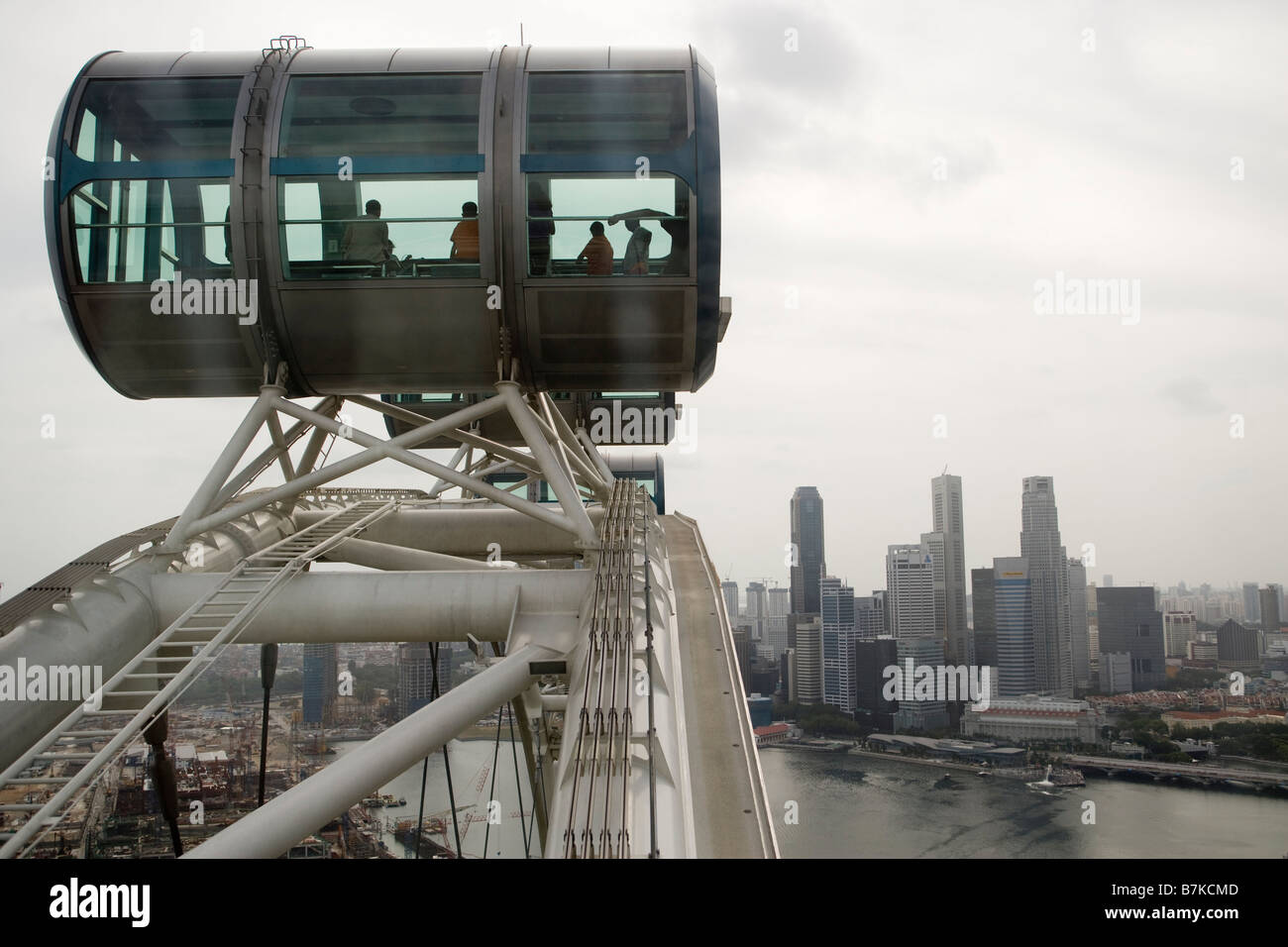 Passengers are seen in a capsule on the Singapore Flyer in Singapore ...