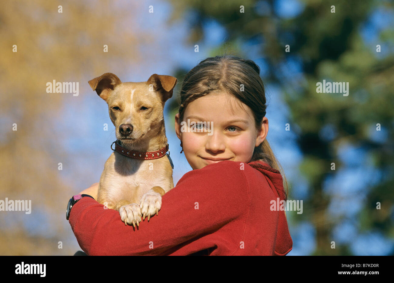 Girls carrying dogs hi-res stock photography and images - Alamy