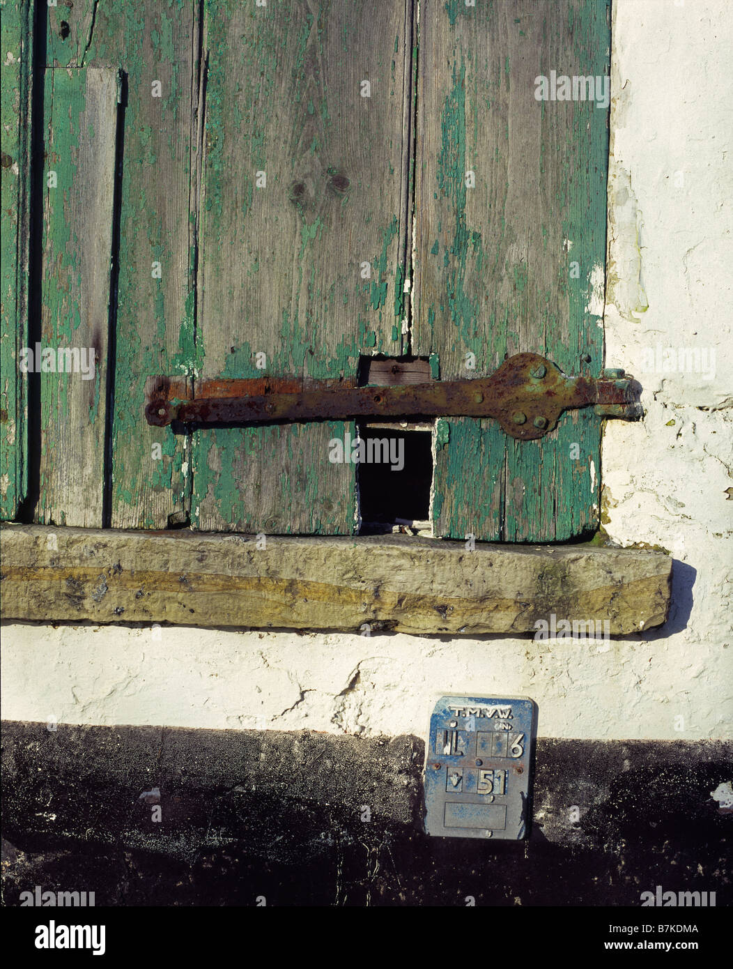 Broken shutter on an old house Stock Photo - Alamy