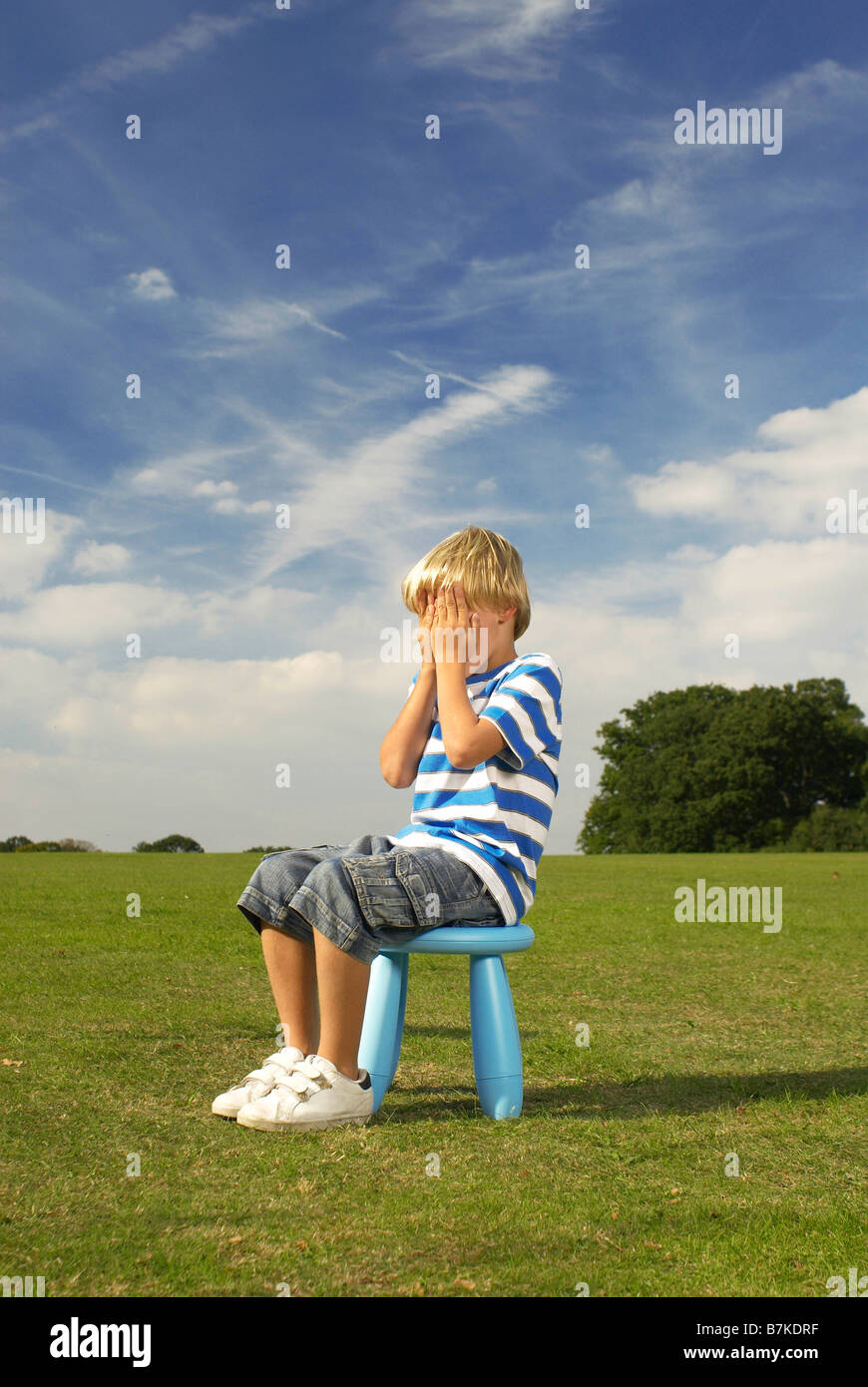 Sitting on stool hi-res stock photography and images - Alamy