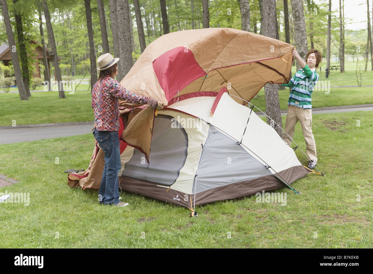 Men Ptching a Tent Stock Photo - Alamy