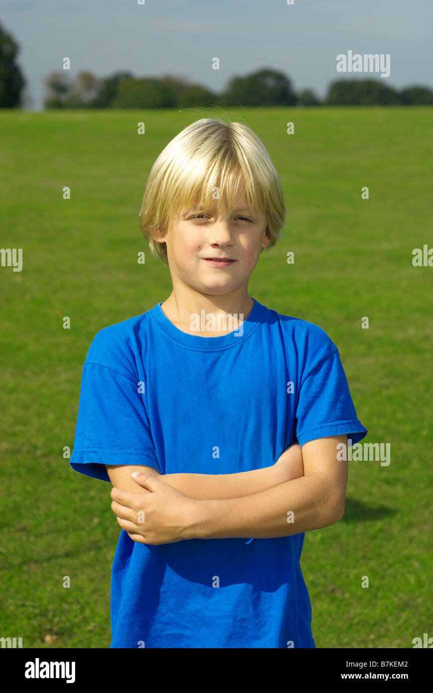 young boy with arms folded Stock Photo - Alamy
