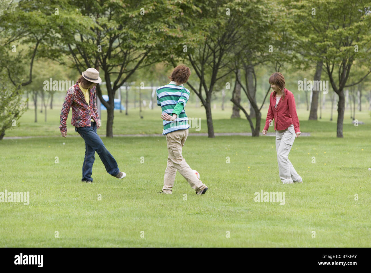 Group of Young People Playing Soccer Stock Photo - Alamy