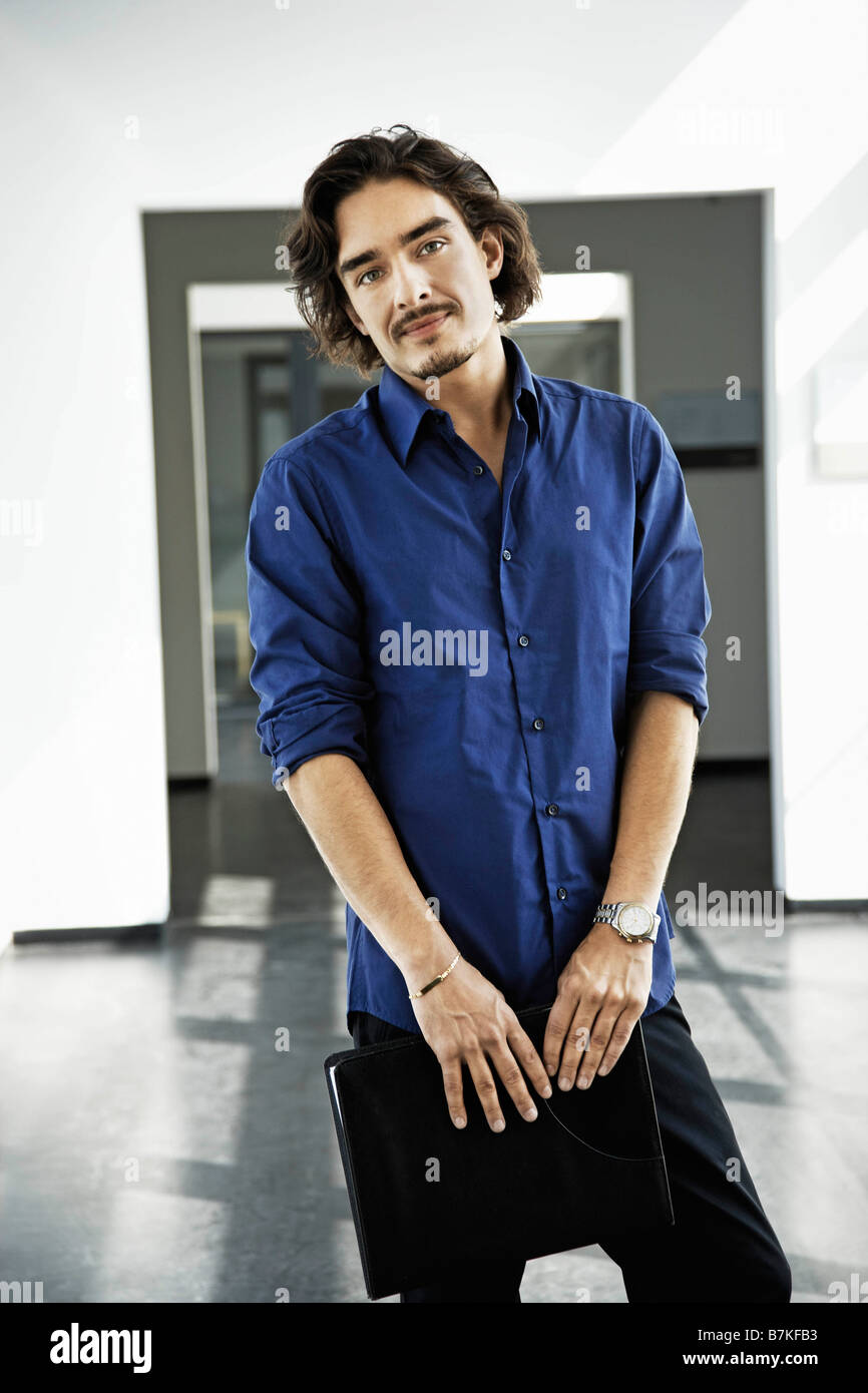 Man holding file hi-res stock photography and images - Alamy