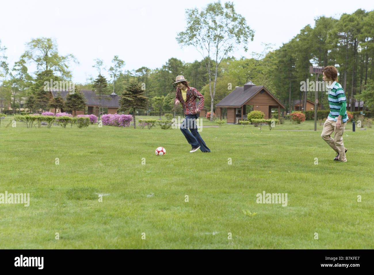 Young Men Playing Soccer Stock Photo - Alamy