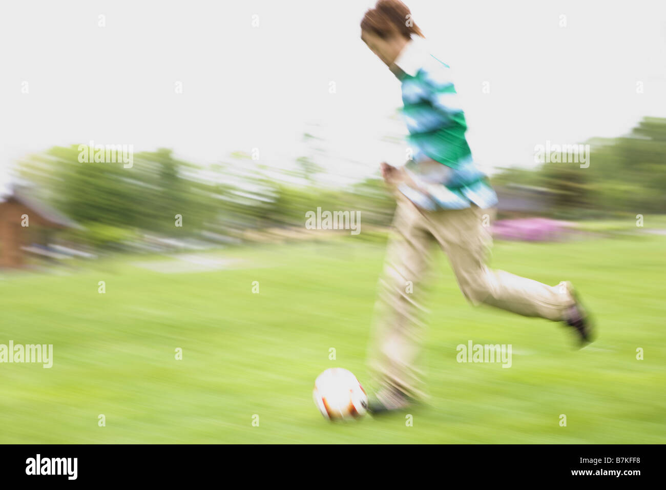 Young Man Playing Soccer Stock Photo - Alamy