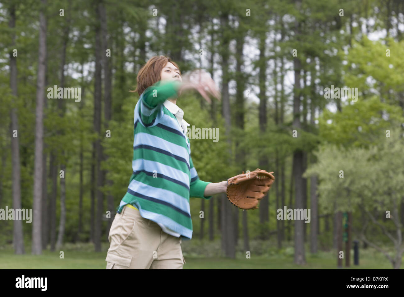 Young Man Playing Catch Stock Photo - Alamy