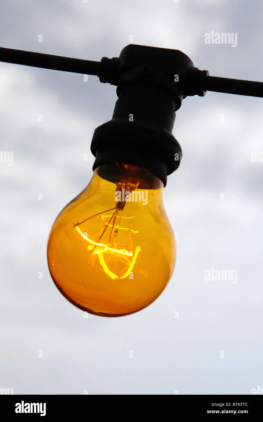 Yellow light bulb Stock Photo - Alamy