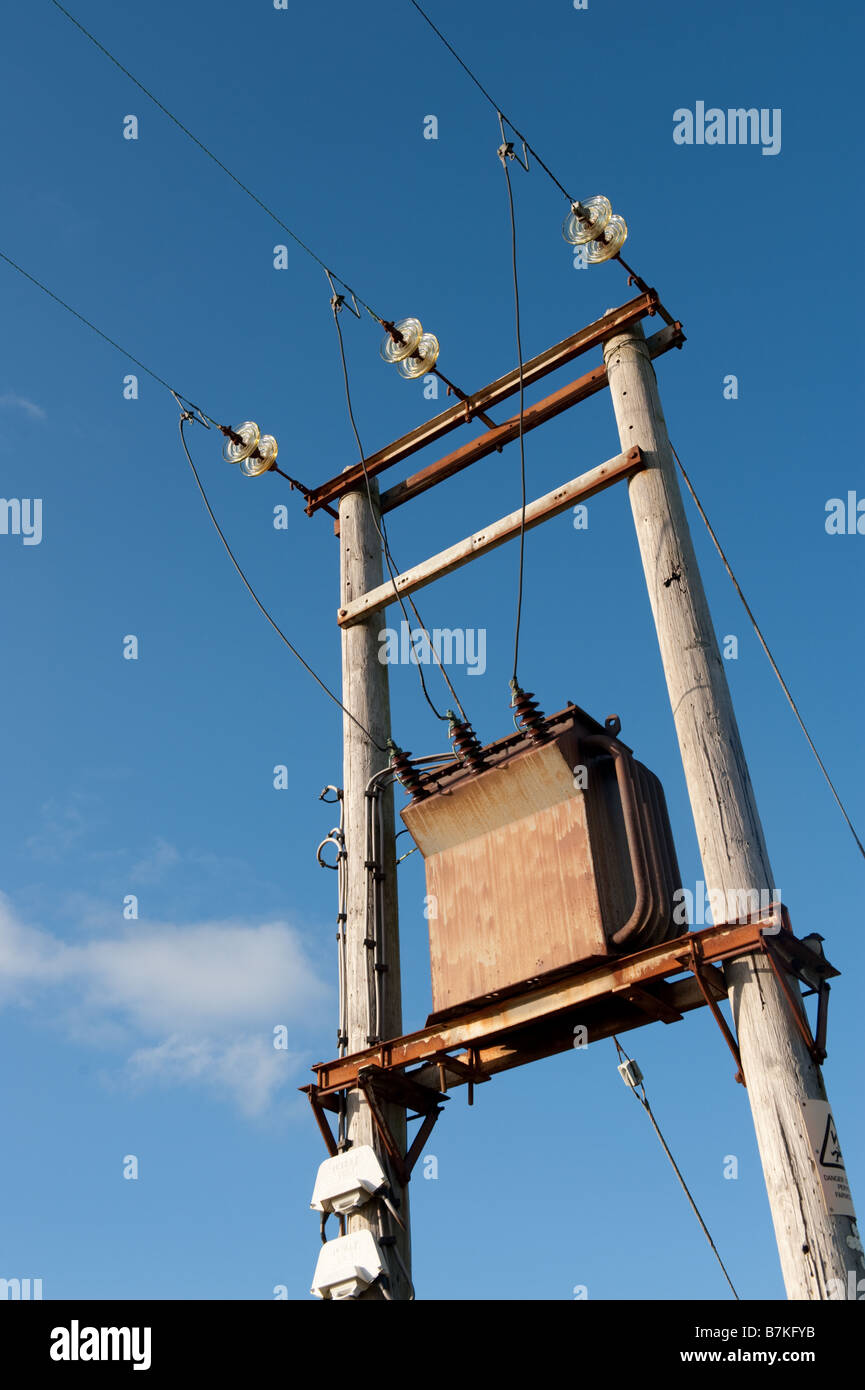 Electricity supply - electrical transformer on a pylon Stock Photo - Alamy