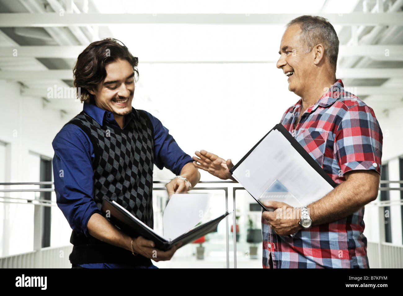 Two men having a business conversation Stock Photo - Alamy