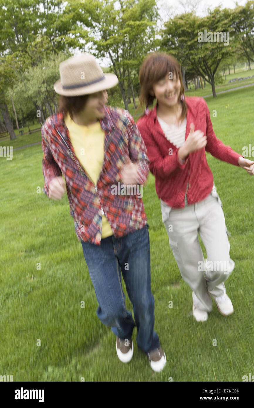 Running smile playground lawn hi-res stock photography and images - Alamy