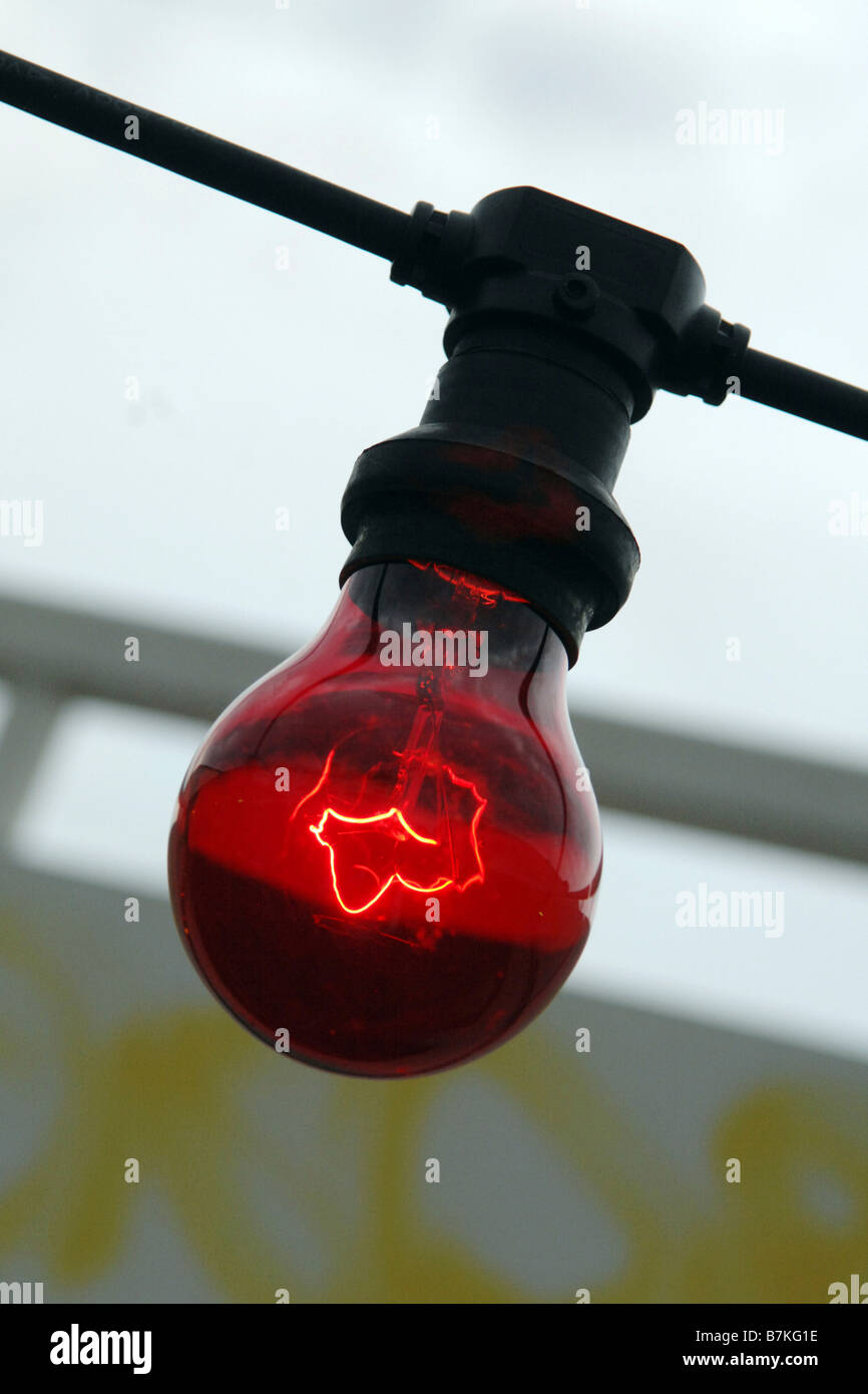 Red light bulb Stock Photo - Alamy