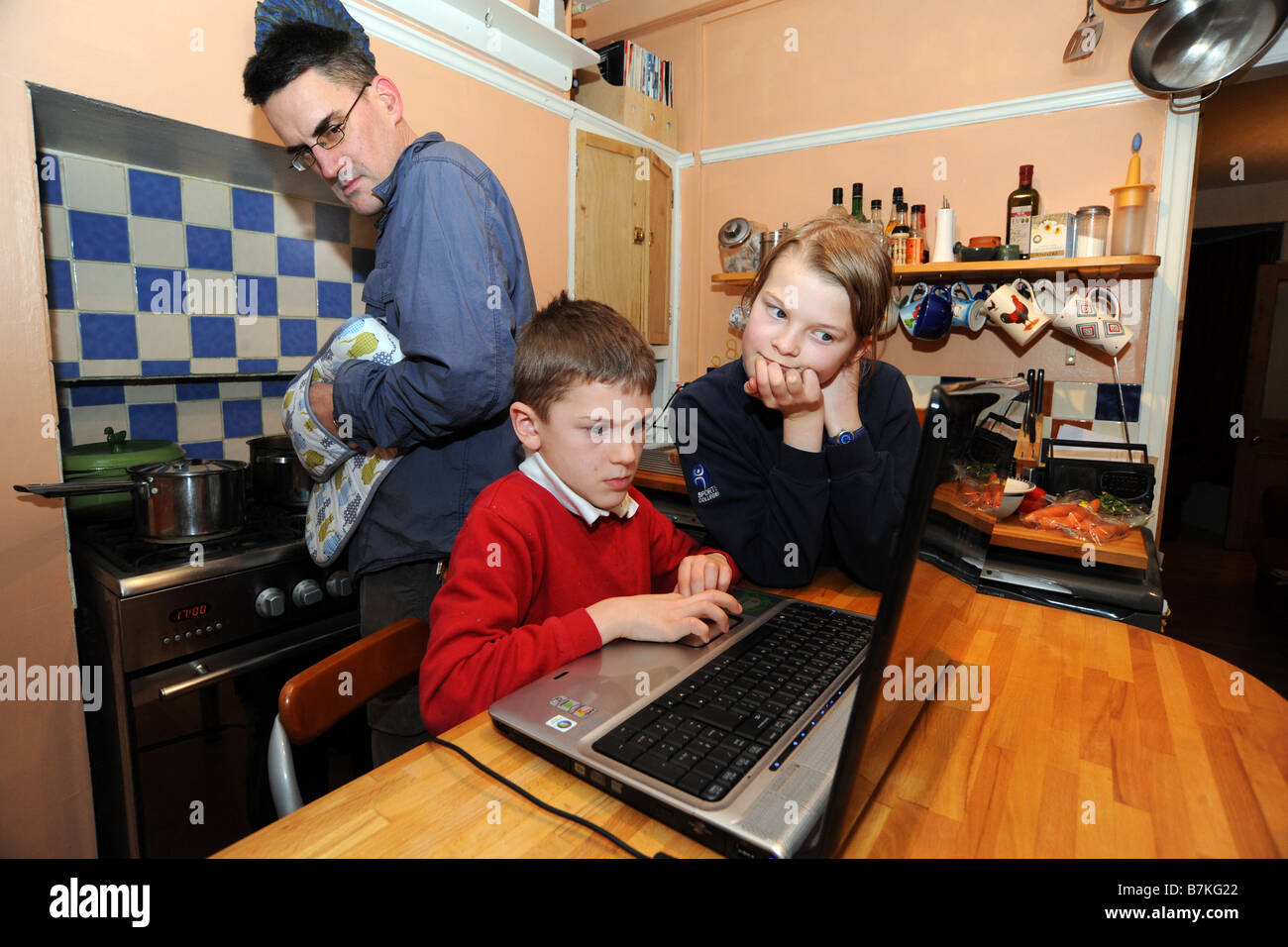 Brother sister computer uniform hi-res stock photography and images - Alamy