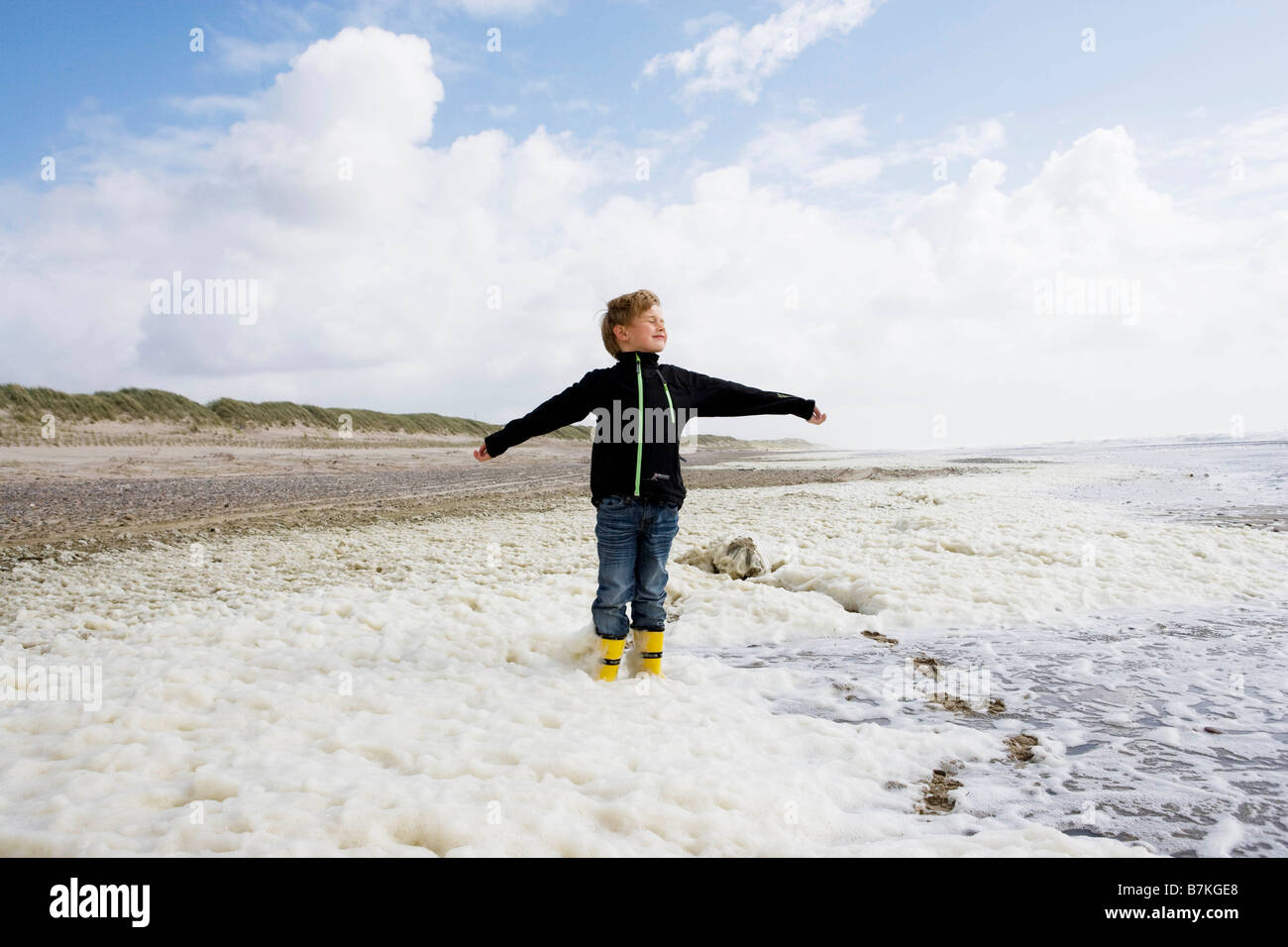 Boy on Beach Stock Photo - Alamy