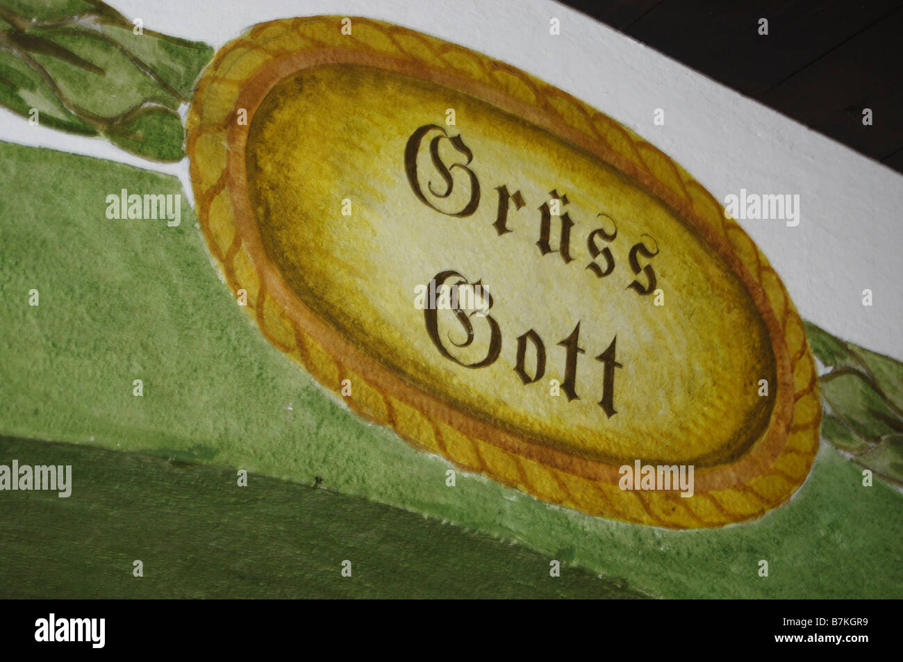 gruss gott sign above entrance to Austrian home Stock Photo - Alamy