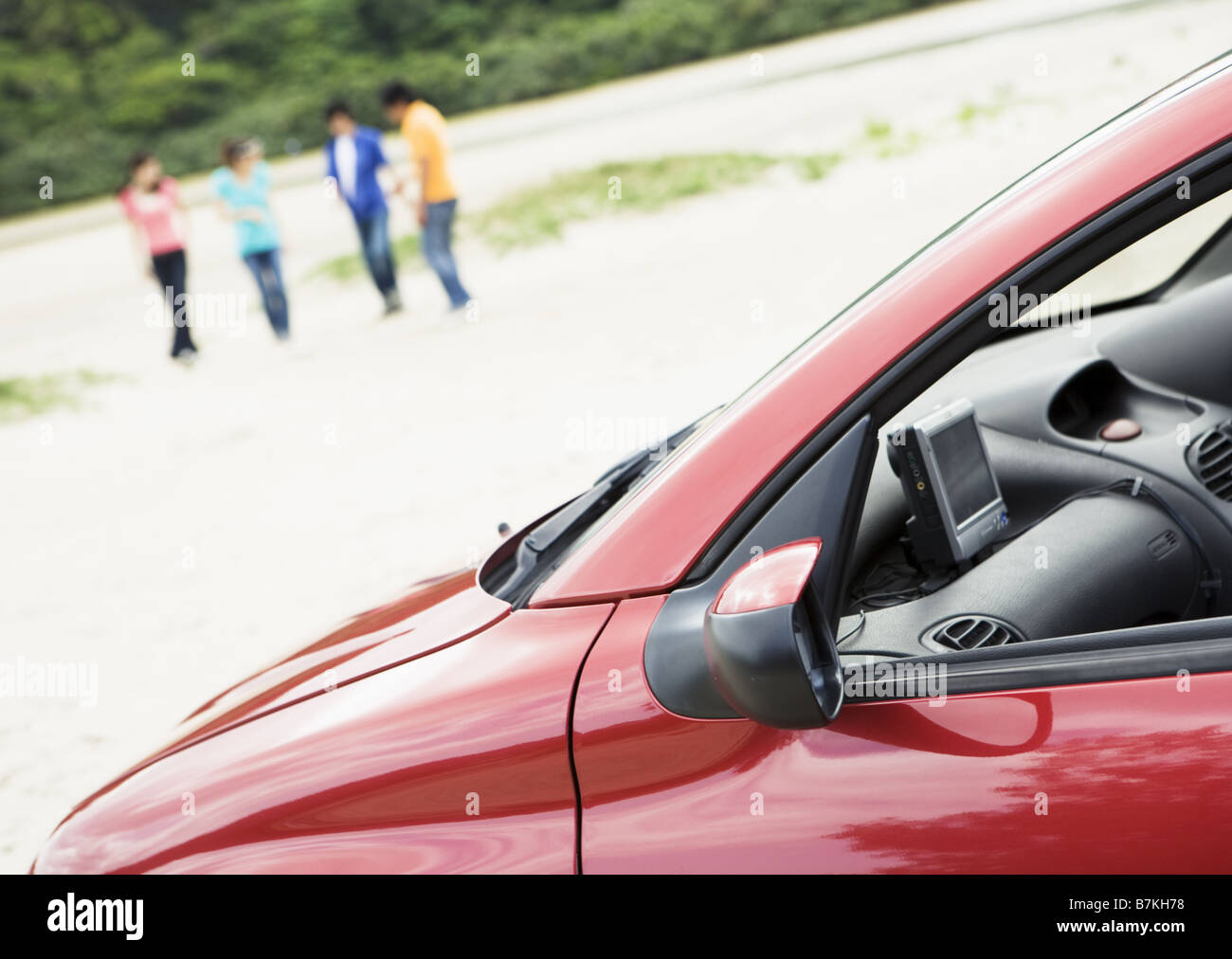 People with a car Stock Photo - Alamy