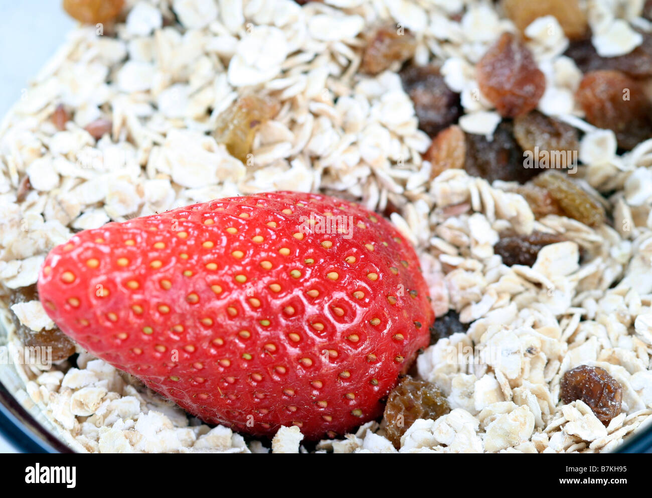 Bowl full of musli and fresh fruits Stock Photo - Alamy
