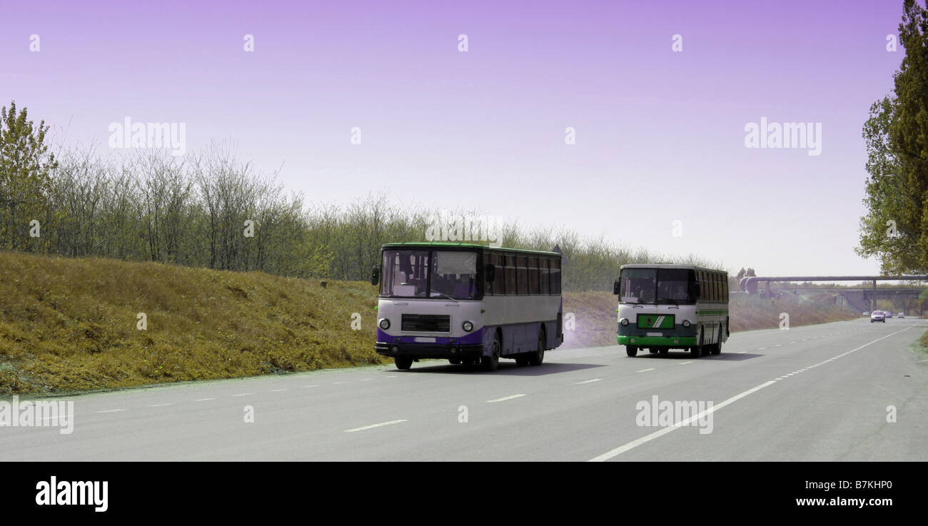 Two buses on the highway viewed from the front Stock Photo - Alamy