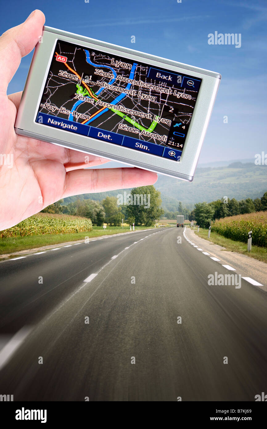 GPS Vehicle navigation system in a man hand Stock Photo - Alamy