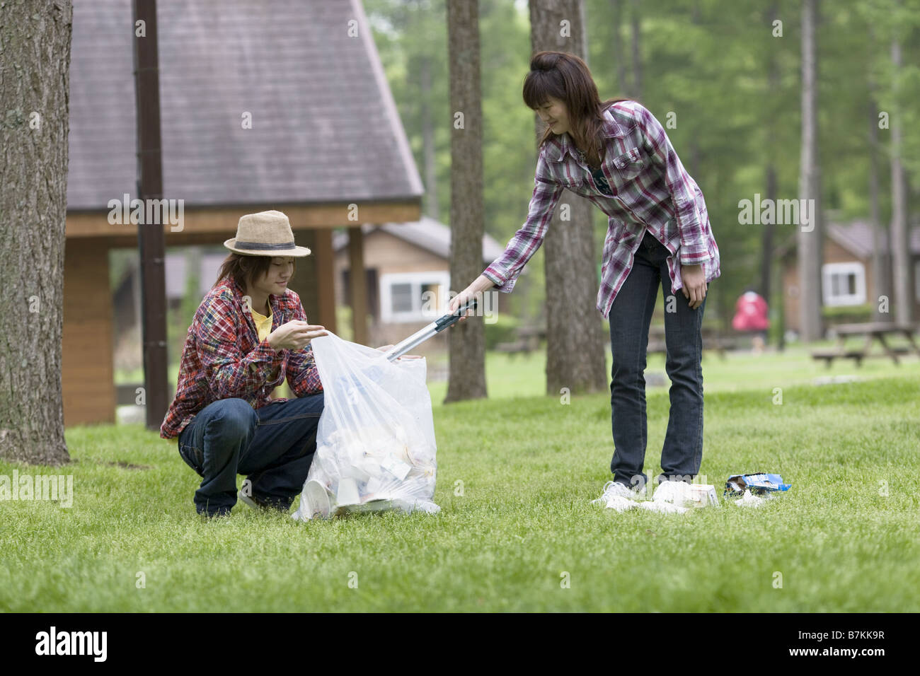 Couple Picking Up Litter Stock Photo - Alamy