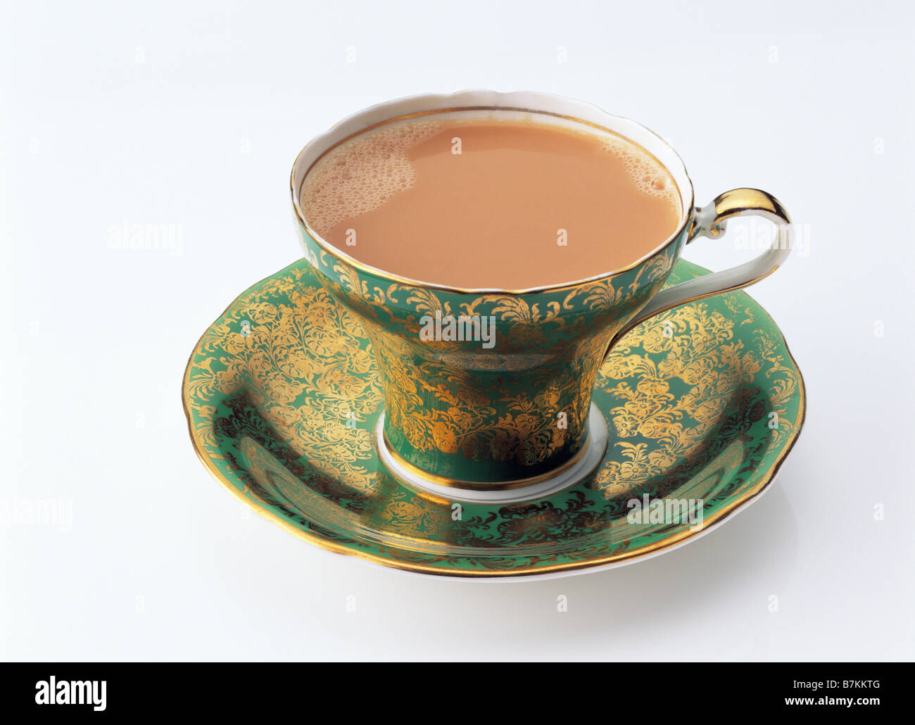 White tea cup saucer gold hi-res stock photography and images - Alamy